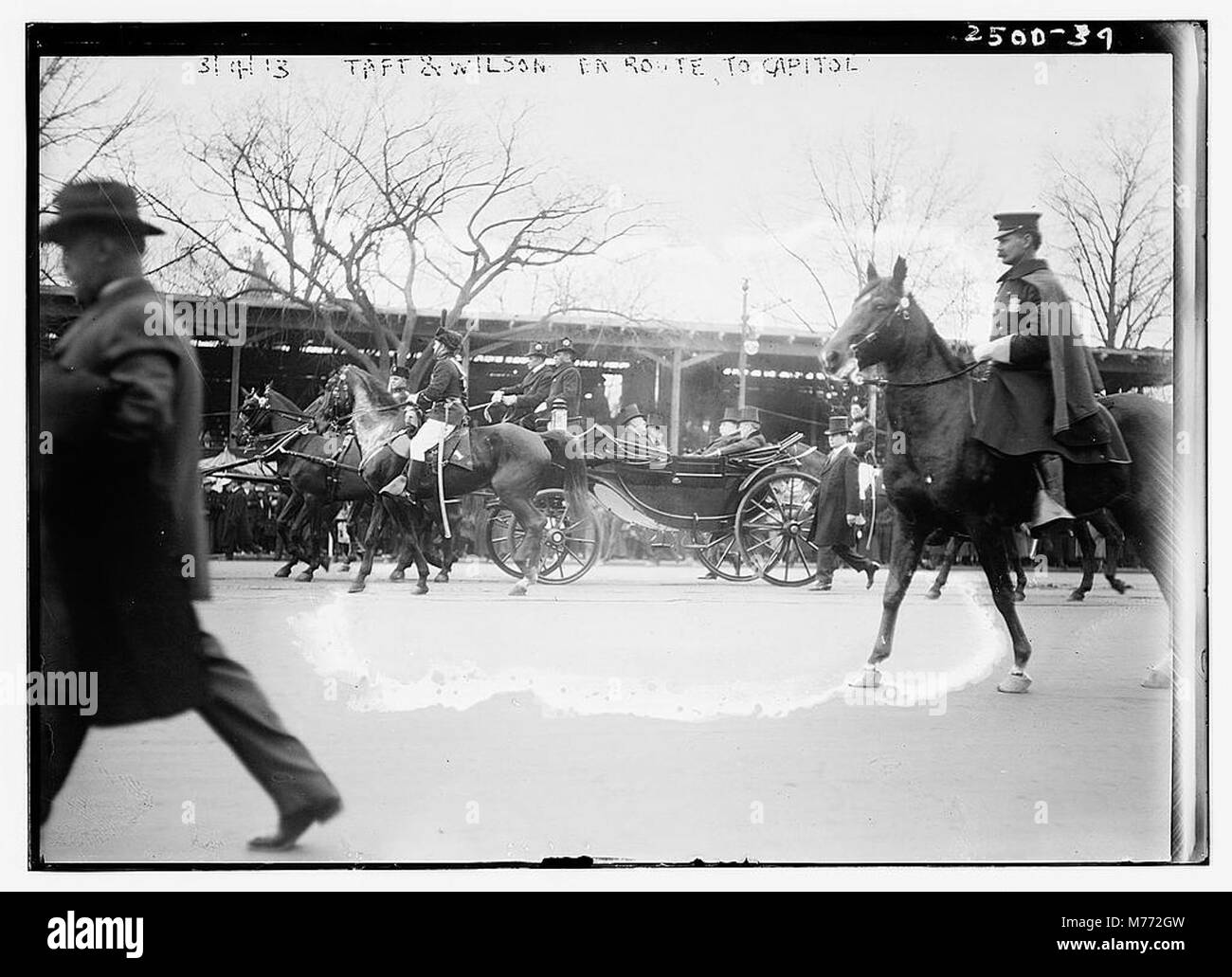 This image shows William Howard Taft and Woodrow Wilson traveling to ...
