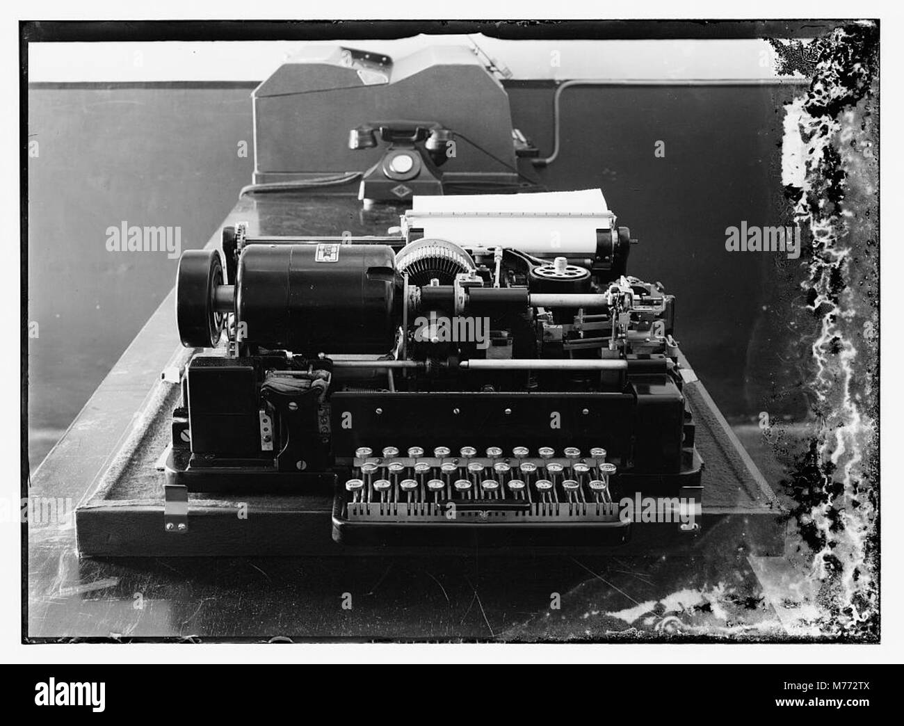 A photograph showing a teleprinter in operation at the Jerusalem ...