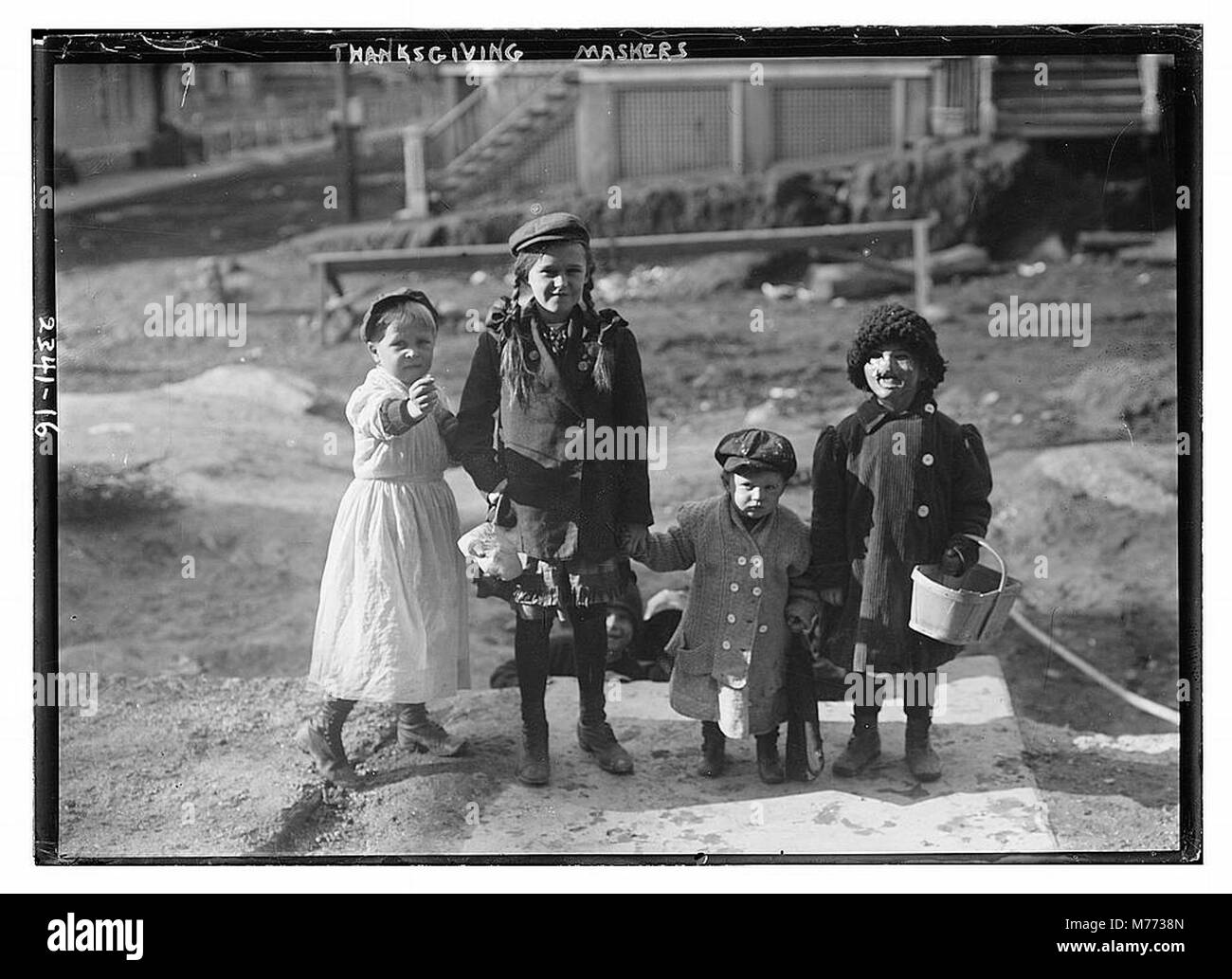 Photograph of people dressed as traditional Thanksgiving maskers ...