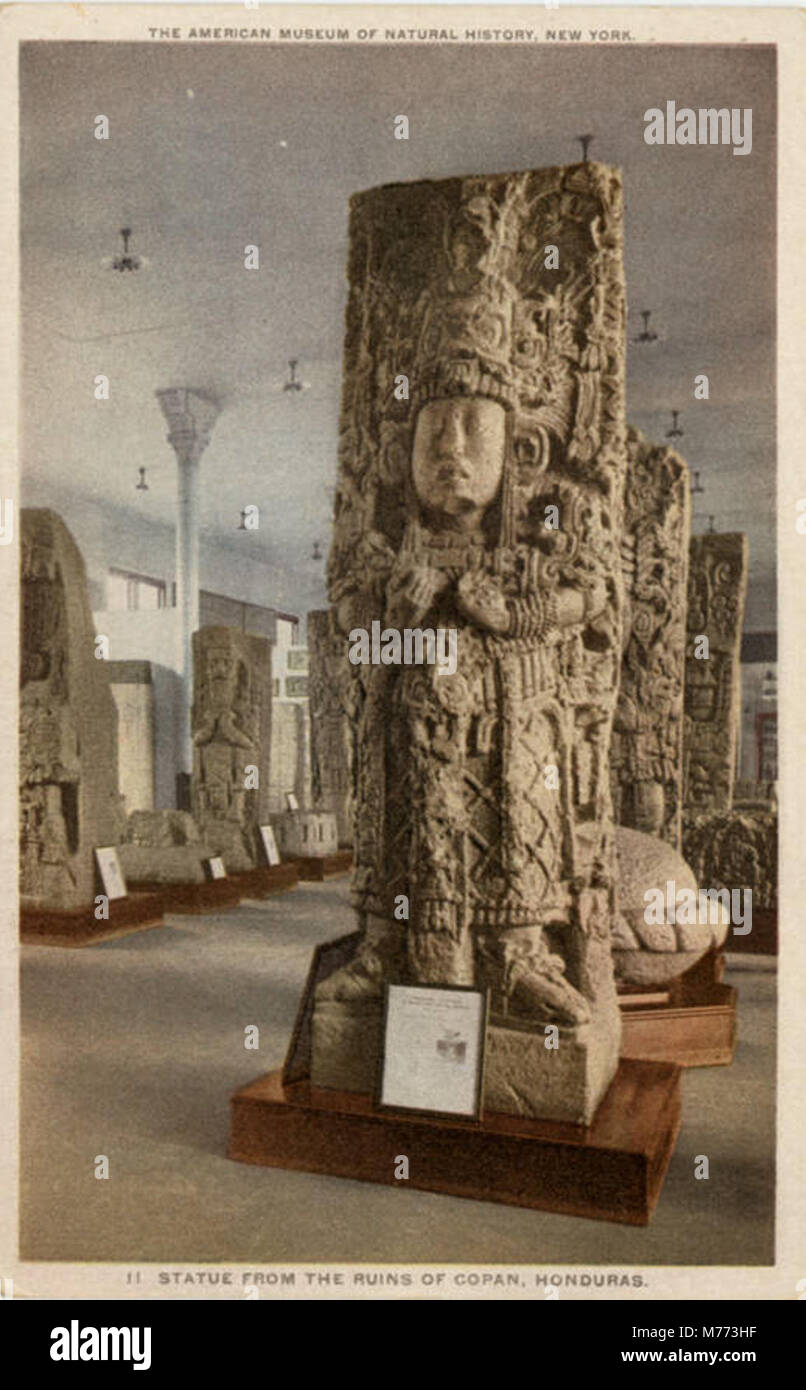 This photograph shows a statue from the ruins of Copan, Honduras ...