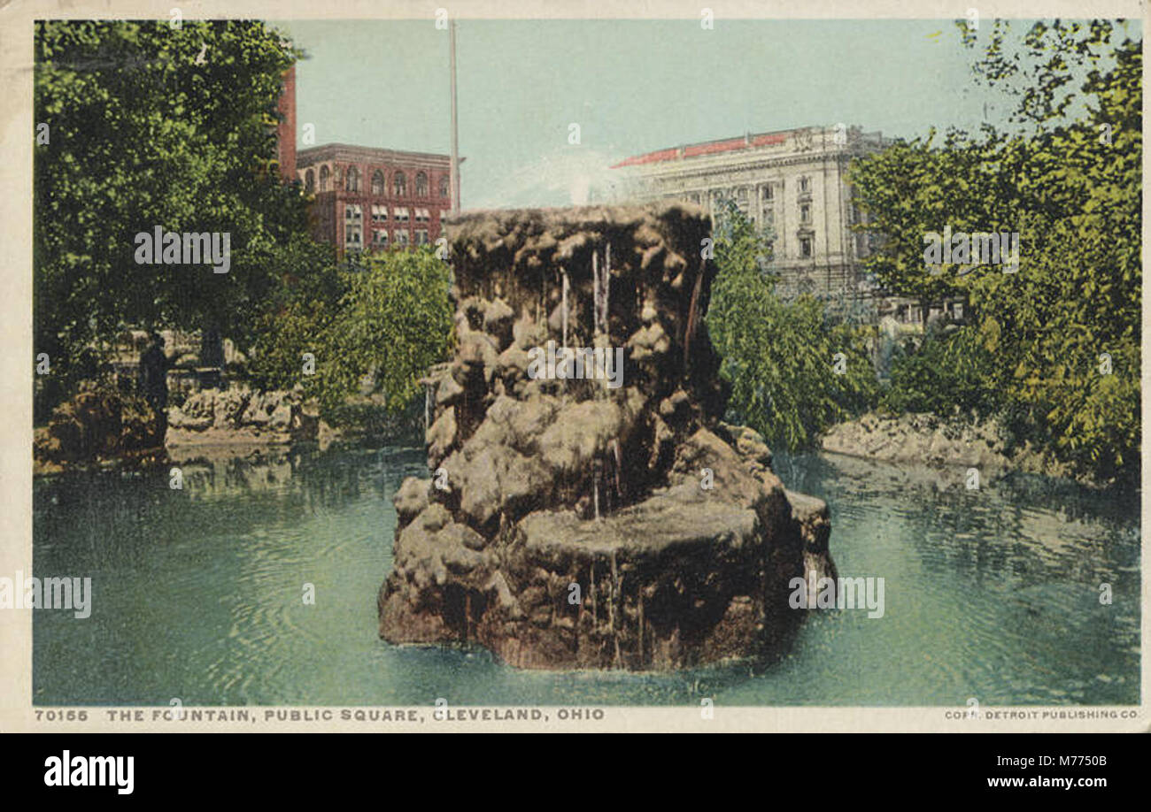 Photograph of a fountain located in a public square, reflecting the ...