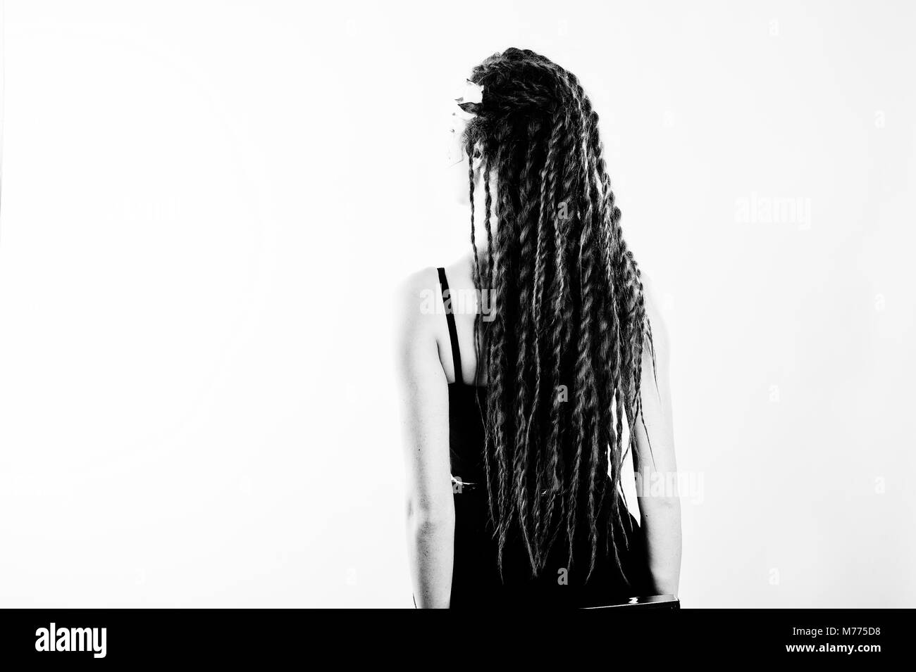 Studio shoot of back girl with dreads on white background Stock Photo ...