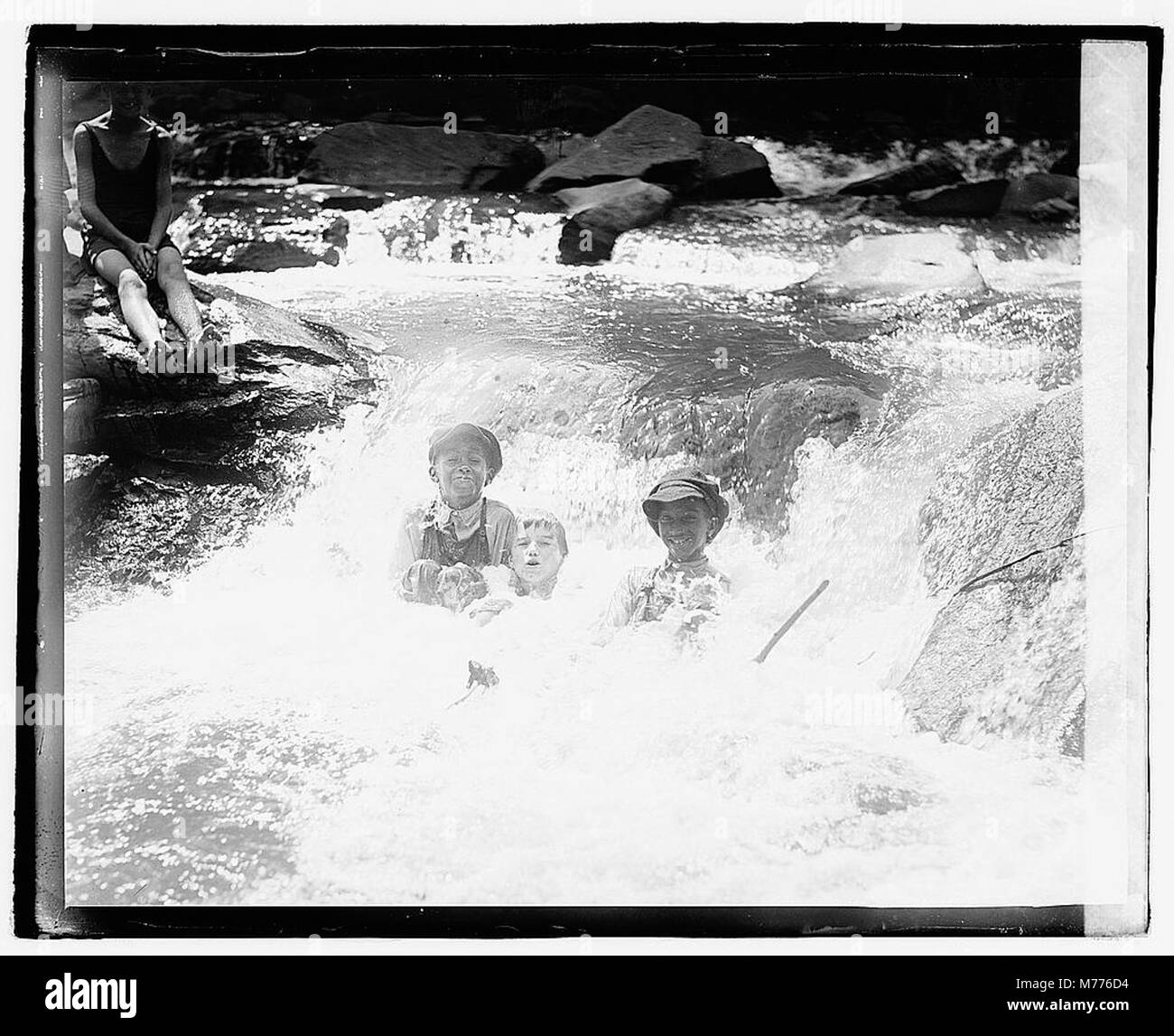 A scene showing people bathing in Rock Creek, a natural feature in the ...