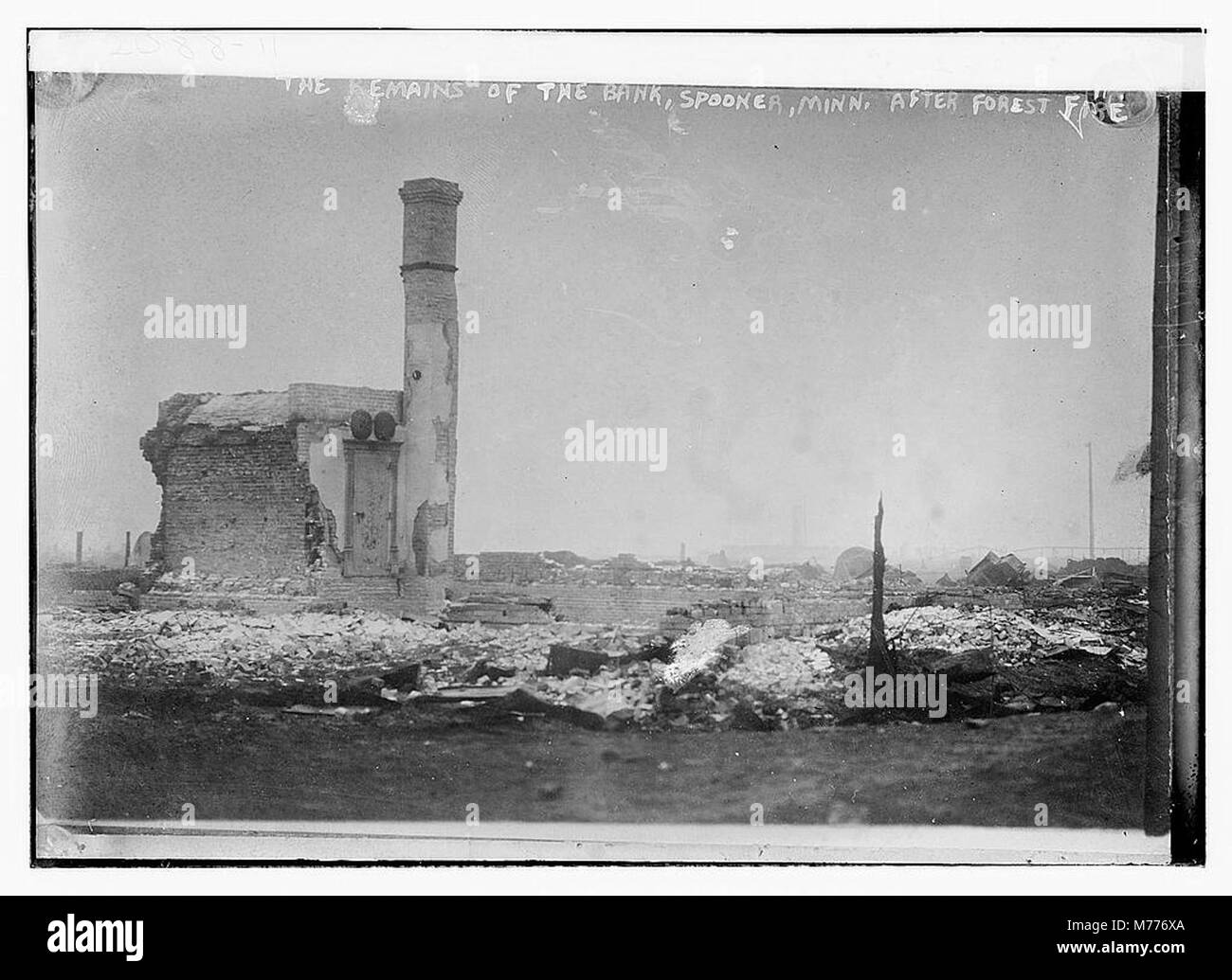 The image shows the remains of a bank in Spooner, Minnesota, after a ...