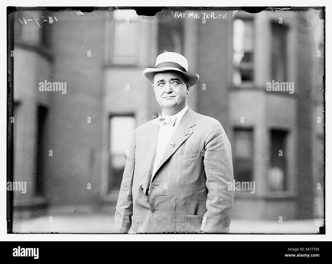 The image portrays Bat Masterson, a famous figure in the American Old ...