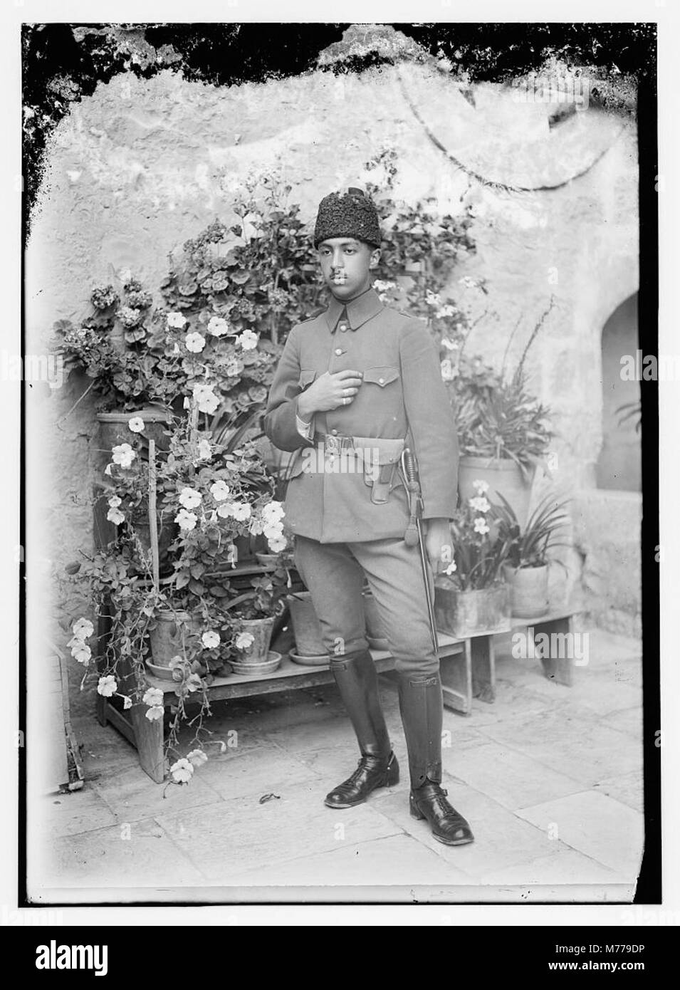 A Turkish officer in the American Colony yard, captured in a photograph ...