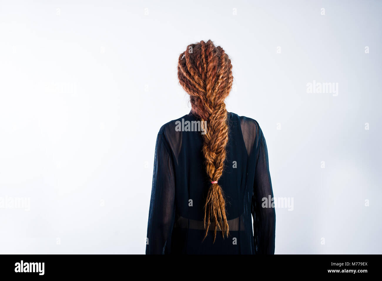 Studio shoot of back girl with dreads on white background Stock Photo ...