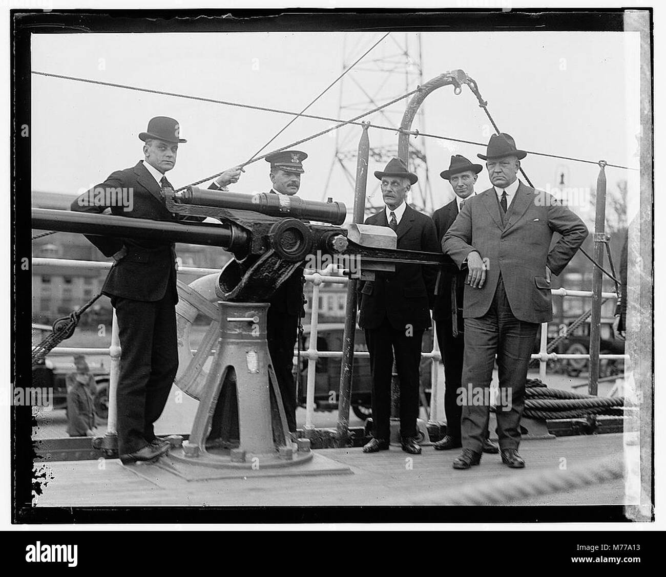 This photograph depicts unidentified men aboard a ship, showcasing a ...