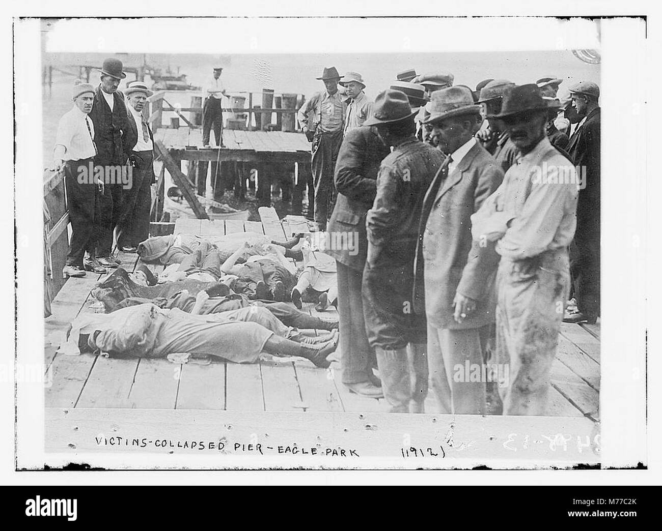The image depicts victims of a collapsed pier at Eagle Park ...