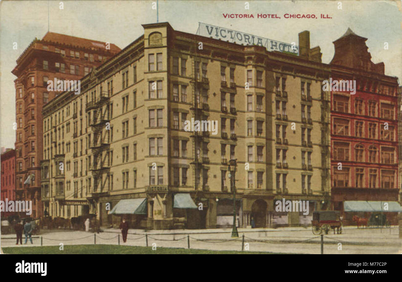 The image features the Victoria Hotel, a historic building likely ...