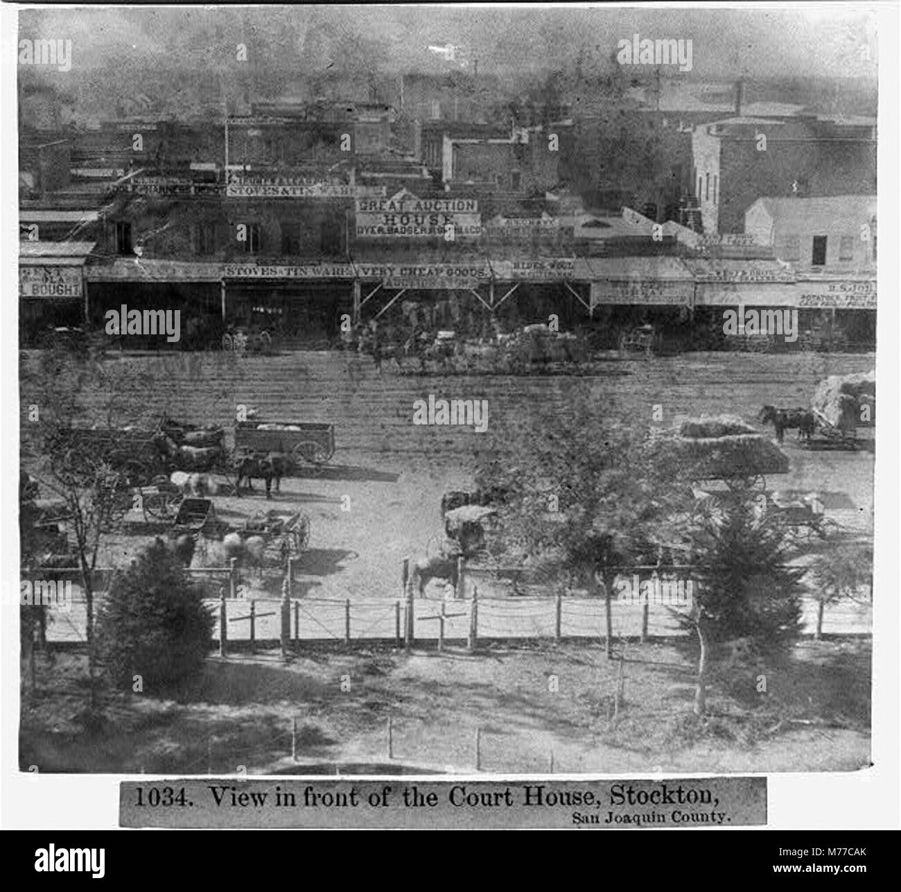 A historical photograph showing a view in front of the Court House in ...