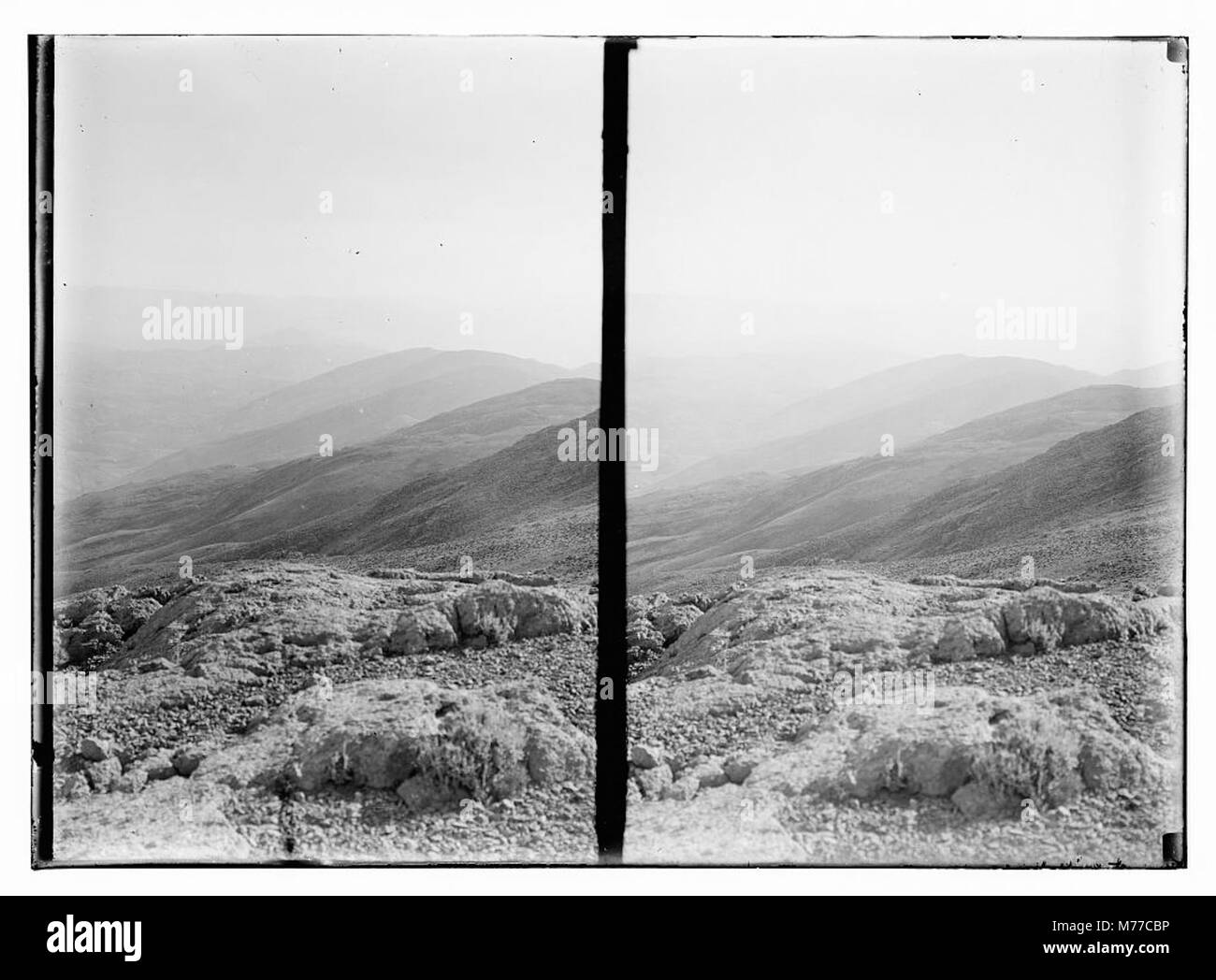 A photograph showcasing rolling hills, capturing the natural undulating ...