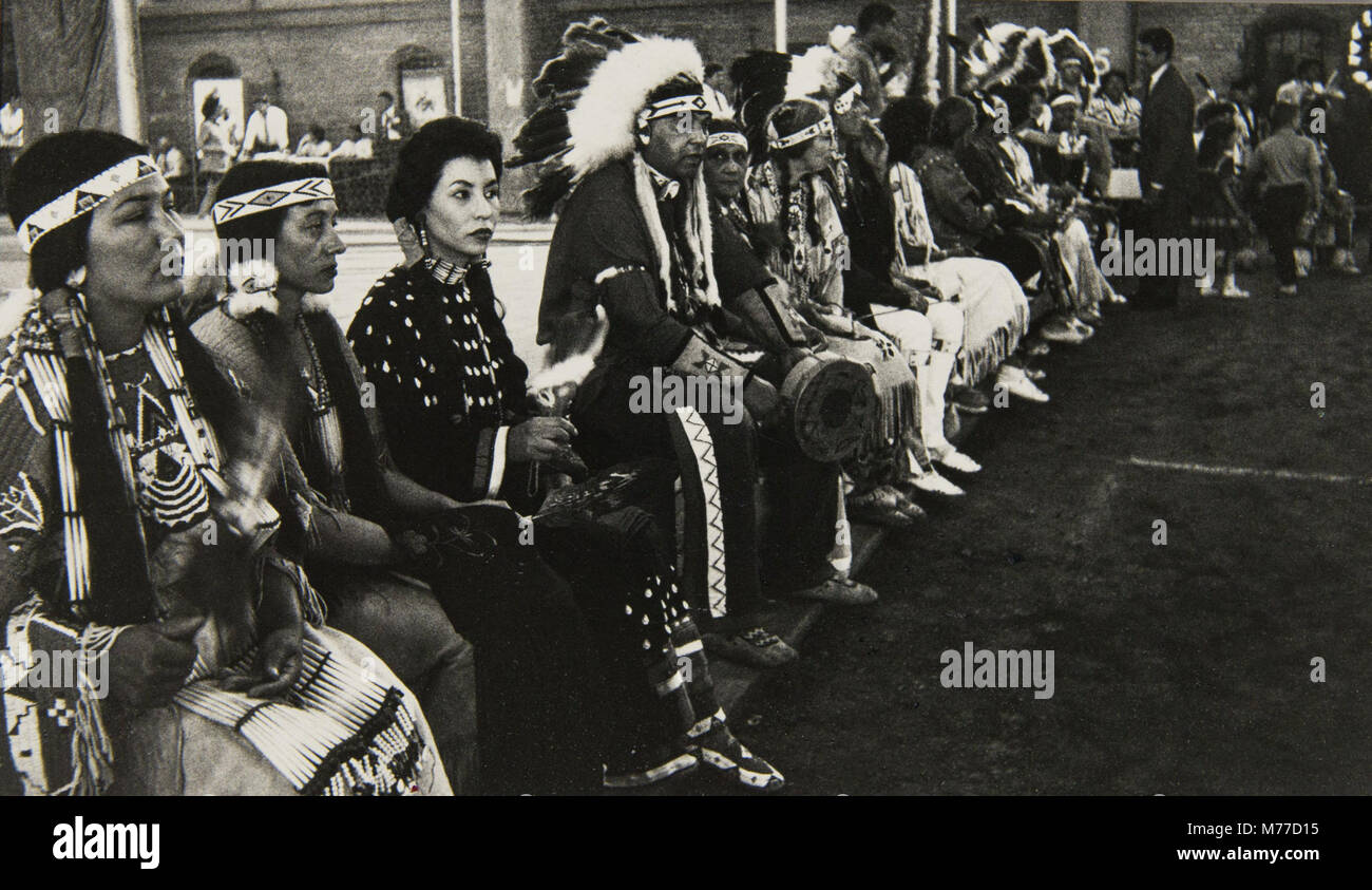 This image captures Native American individuals preparing for the next ...