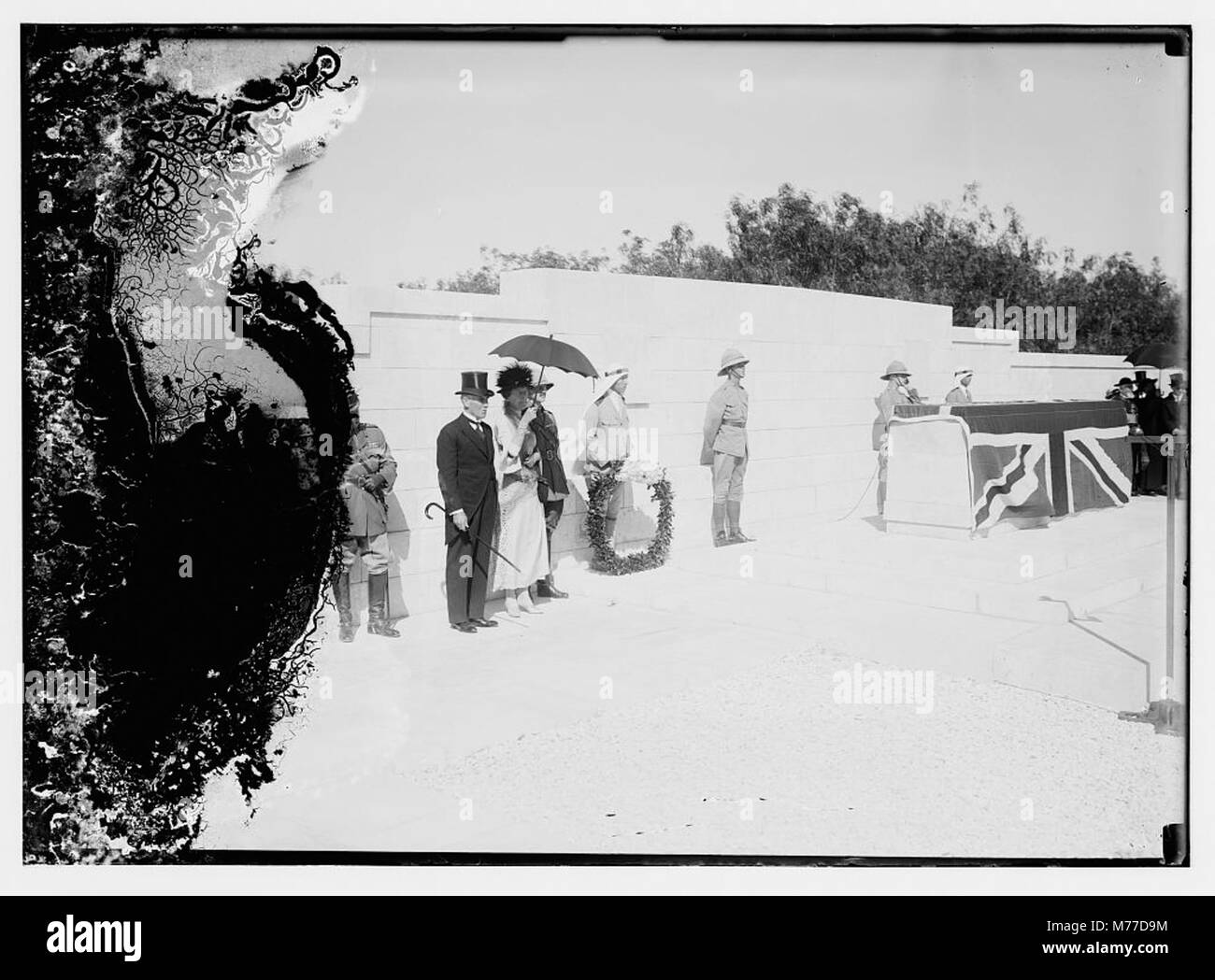 A ceremony at a war cemetery, honoring fallen soldiers. The event ...