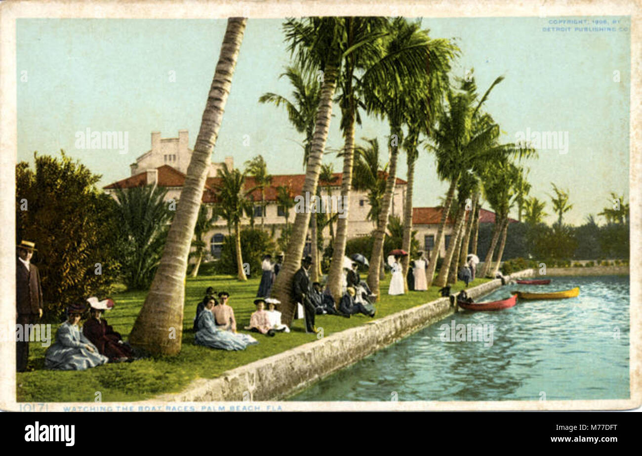 A vintage photograph capturing a moment during a boat race, with ...