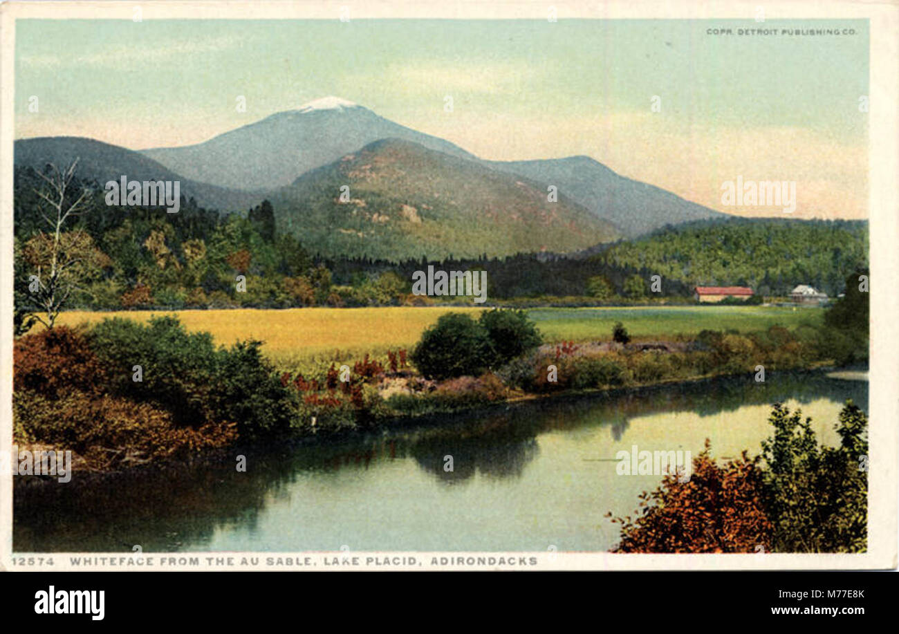 This image showcases Whiteface Mountain, viewed from the Au Sable River ...