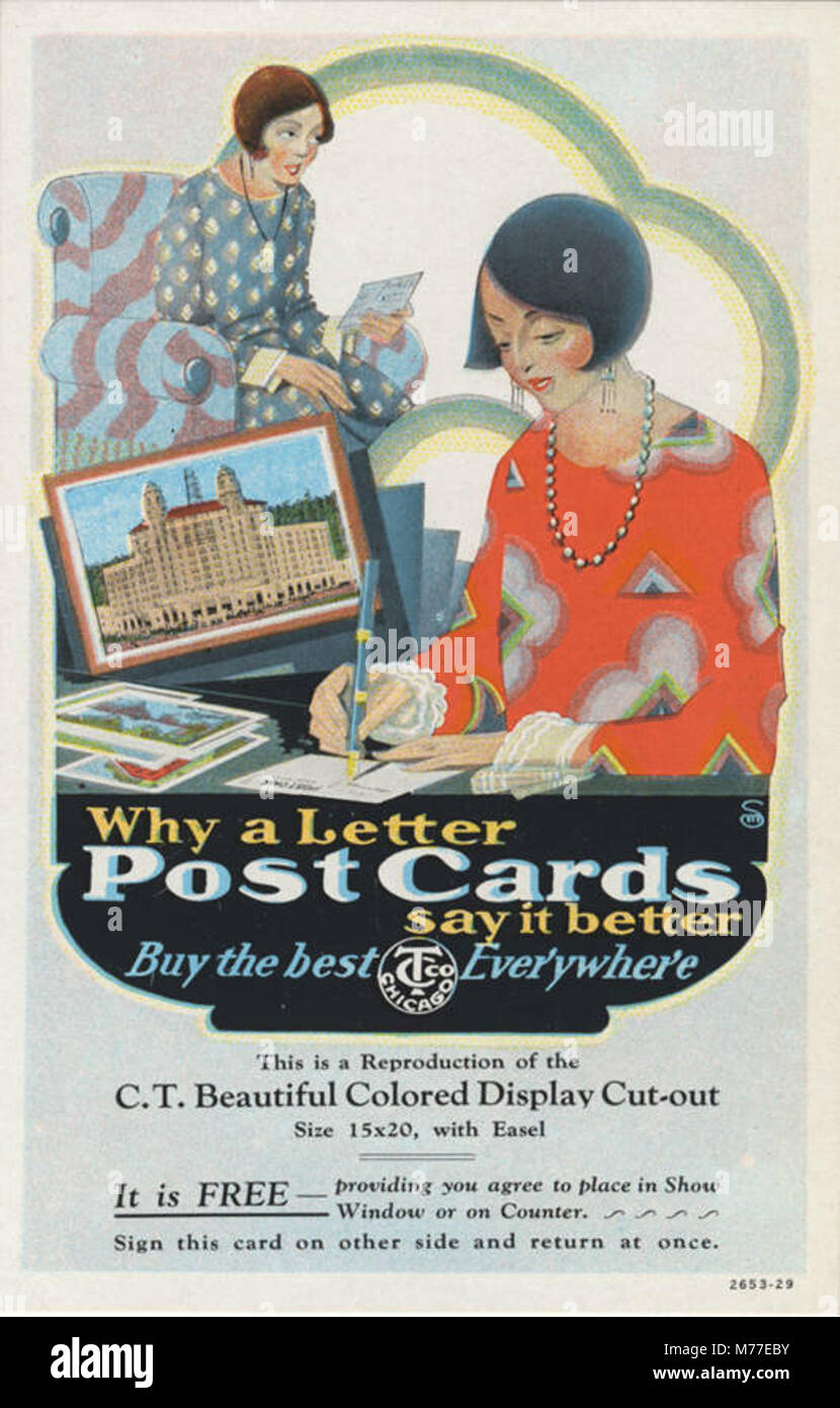 A photograph from the 1920s showing two women engaged with postcards ...