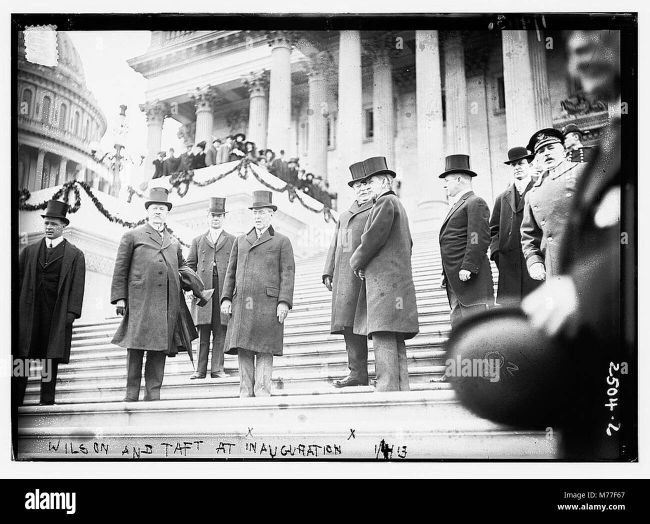 A historical image of Woodrow Wilson and William Howard Taft at the inauguration, capturing a ...