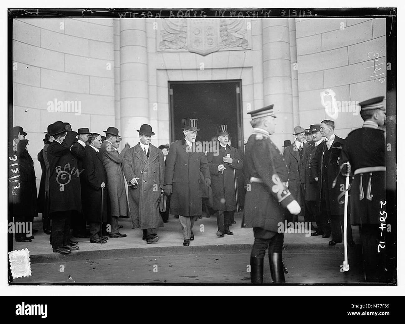 A historical moment showing President Woodrow Wilson arriving in ...