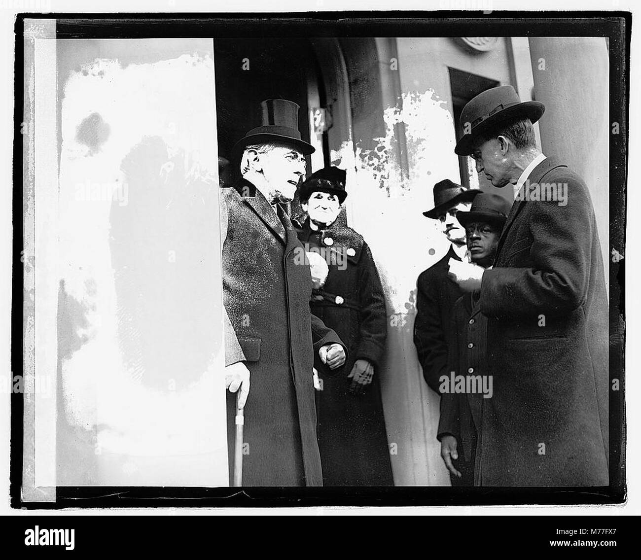 This portrait shows Woodrow Wilson, the 28th U.S. president, offering a ...