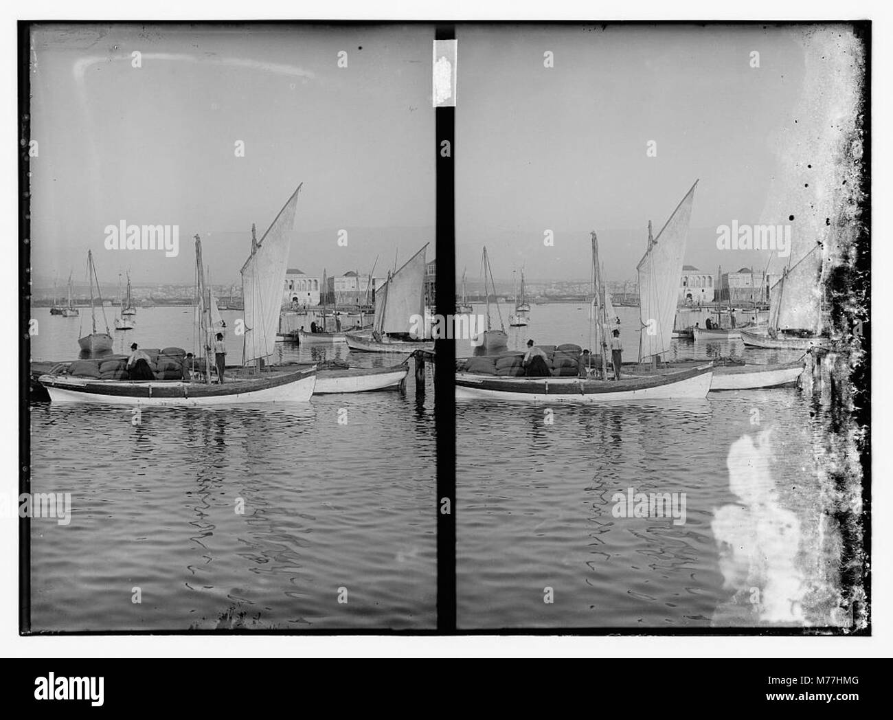 This image showcases boats in a harbor in Syria, providing a glimpse ...