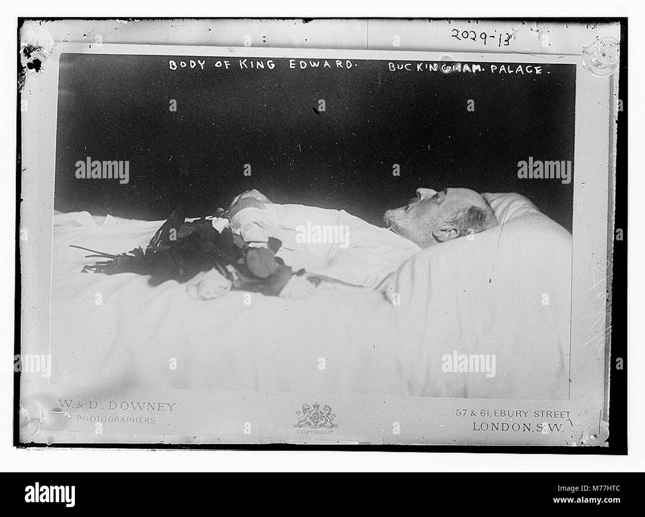 A historical image showing the body of King Edward lying in state at ...
