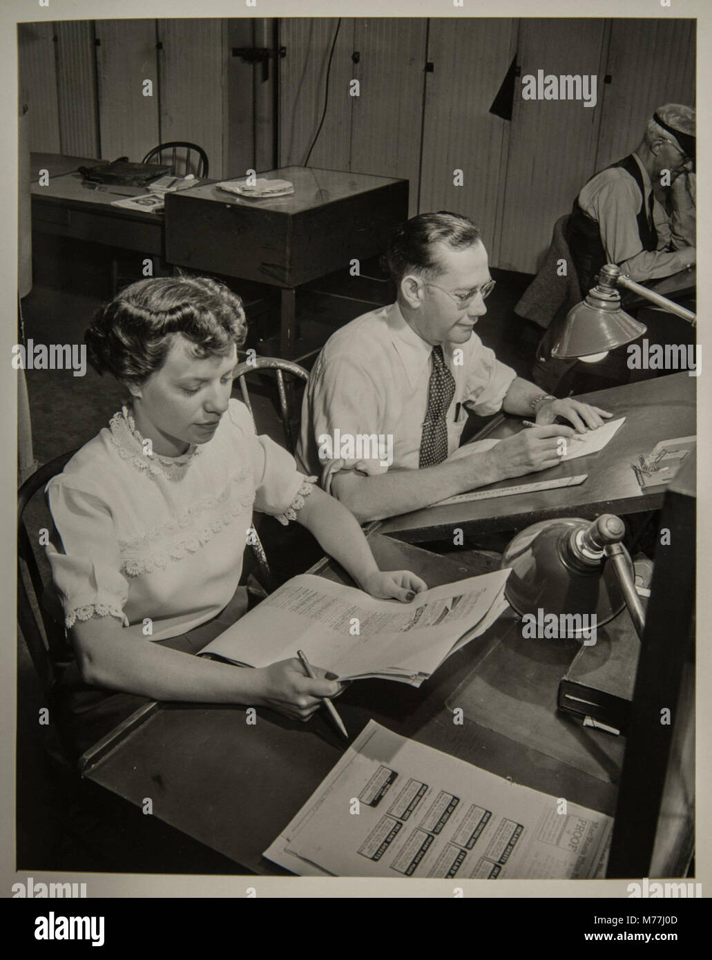 A photograph showing the typesetting process in a book manufacturing ...