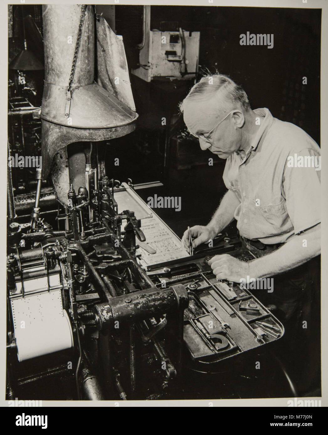 This image shows the process of typesetting in book manufacturing, a ...
