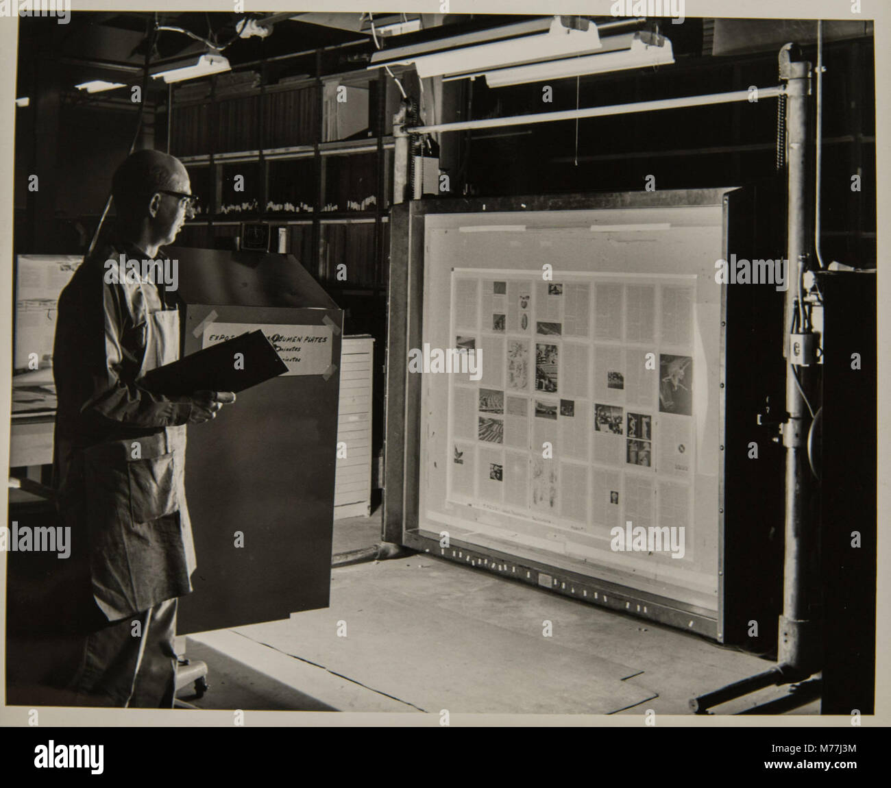 This photograph depicts book manufacturing processes, specifically ...