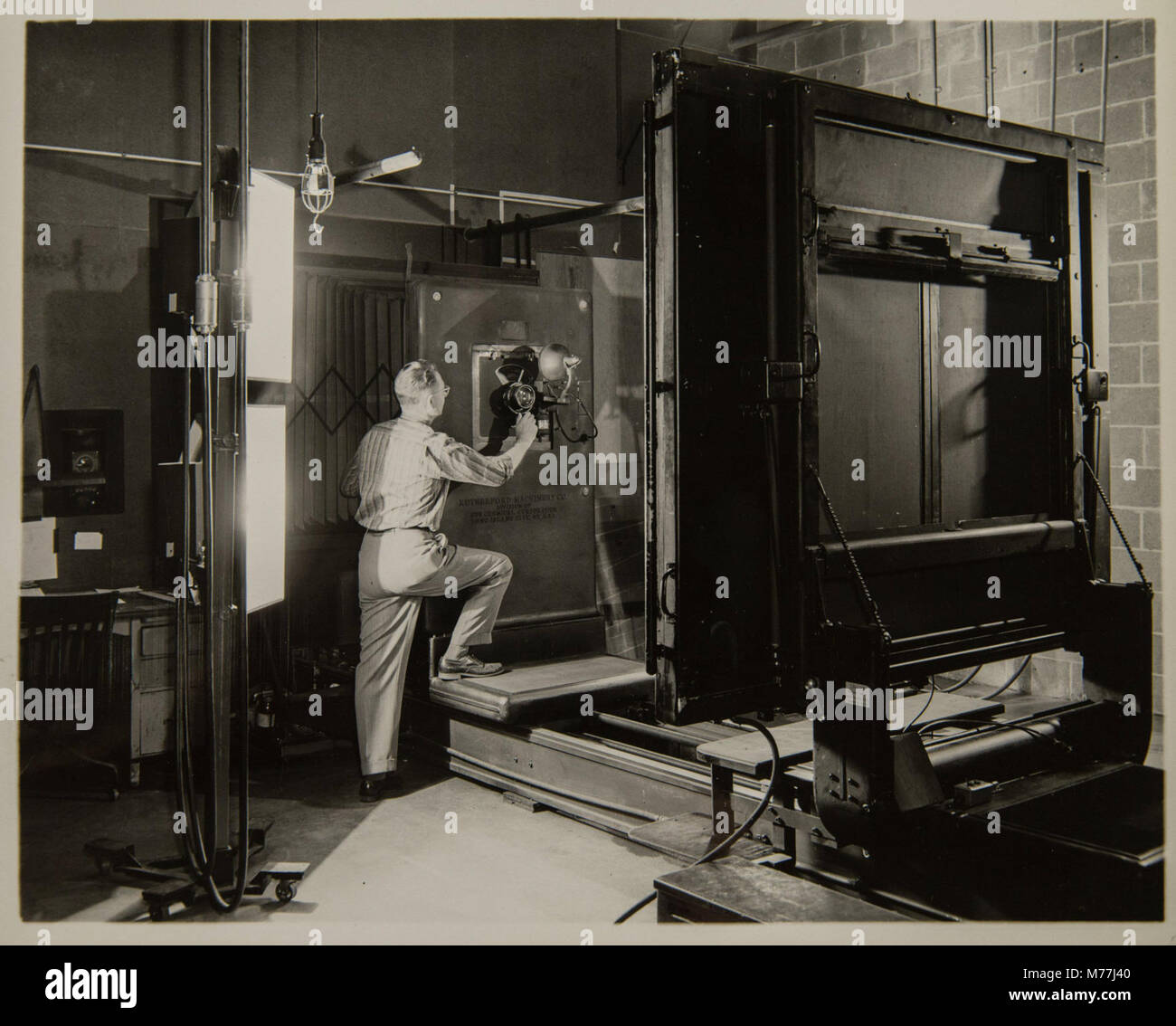 An image depicting the process of book manufacturing, specifically ...