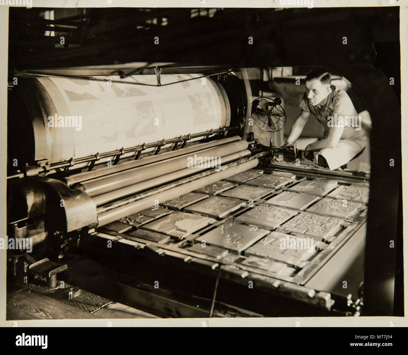 This image shows a letter press used in book manufacturing, a key part ...