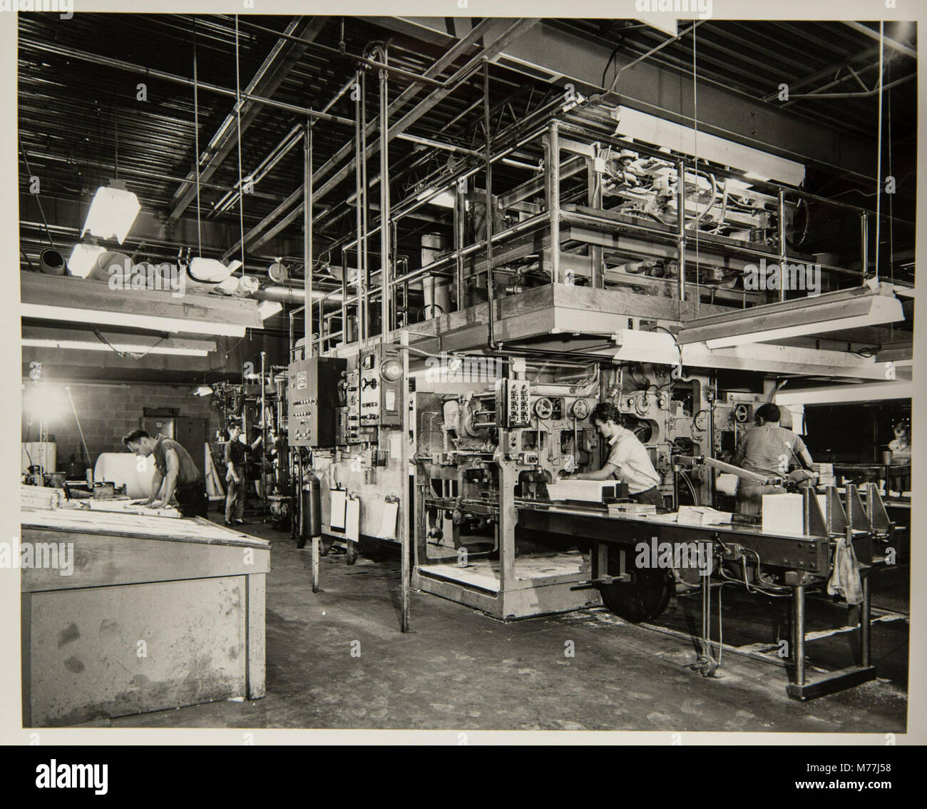 This image showcases a book manufacturing process using letterpress ...