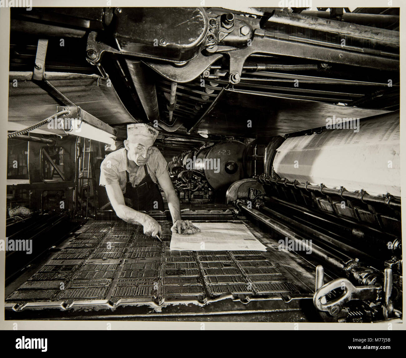 An image illustrating the process of book manufacturing, focusing on ...