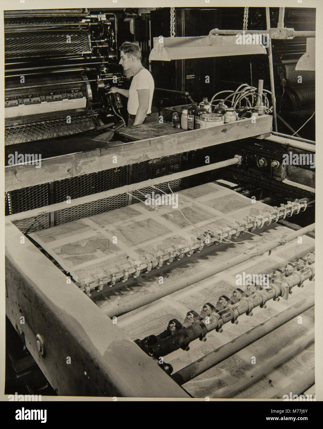 A photo showcasing the book manufacturing process using sheet-fed ...