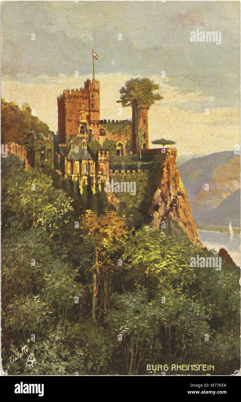 This photograph captures the Burg Rheinstein, a historic castle located ...