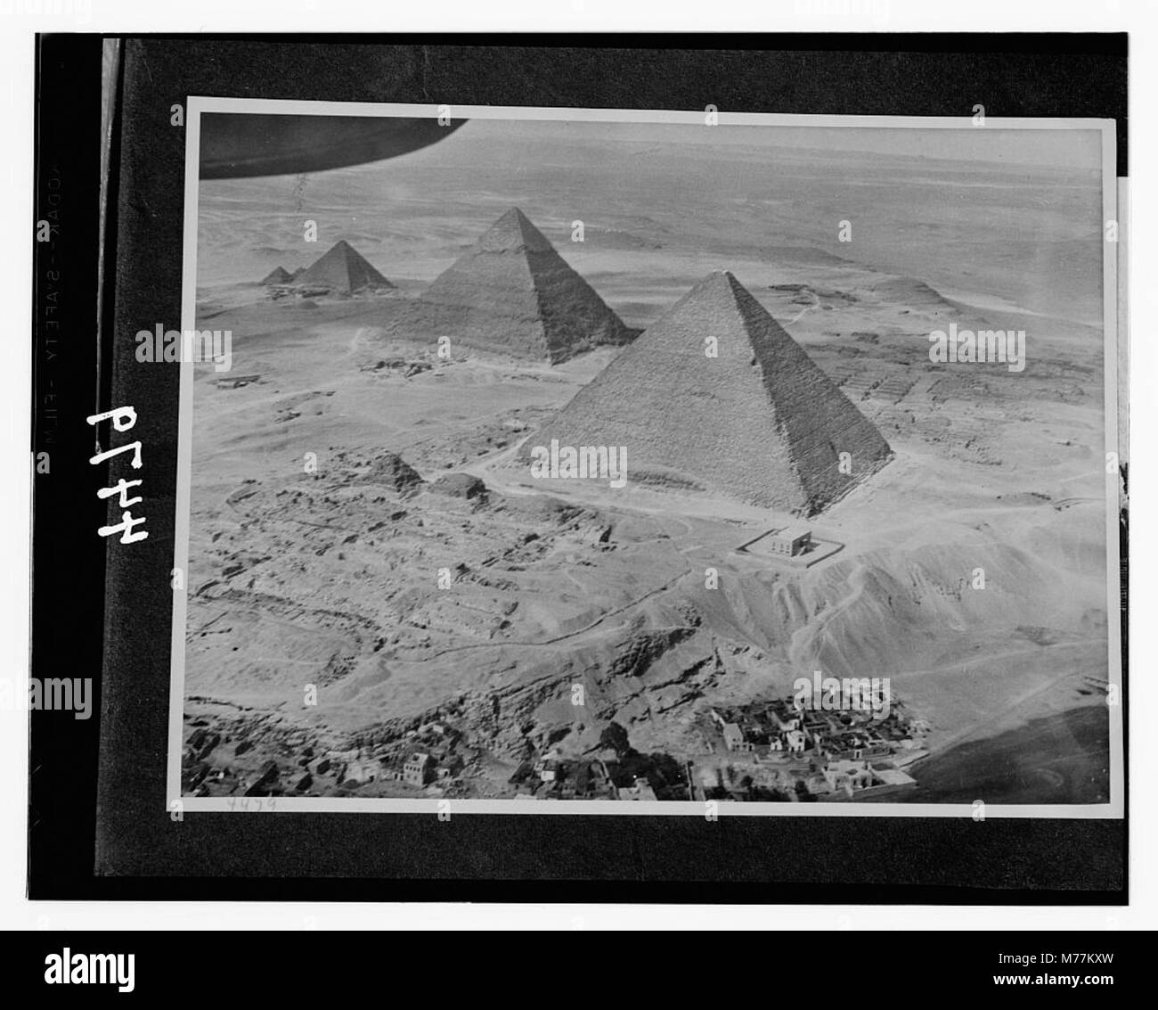 The photograph shows a bird's eye view of the three Great Pyramids of ...