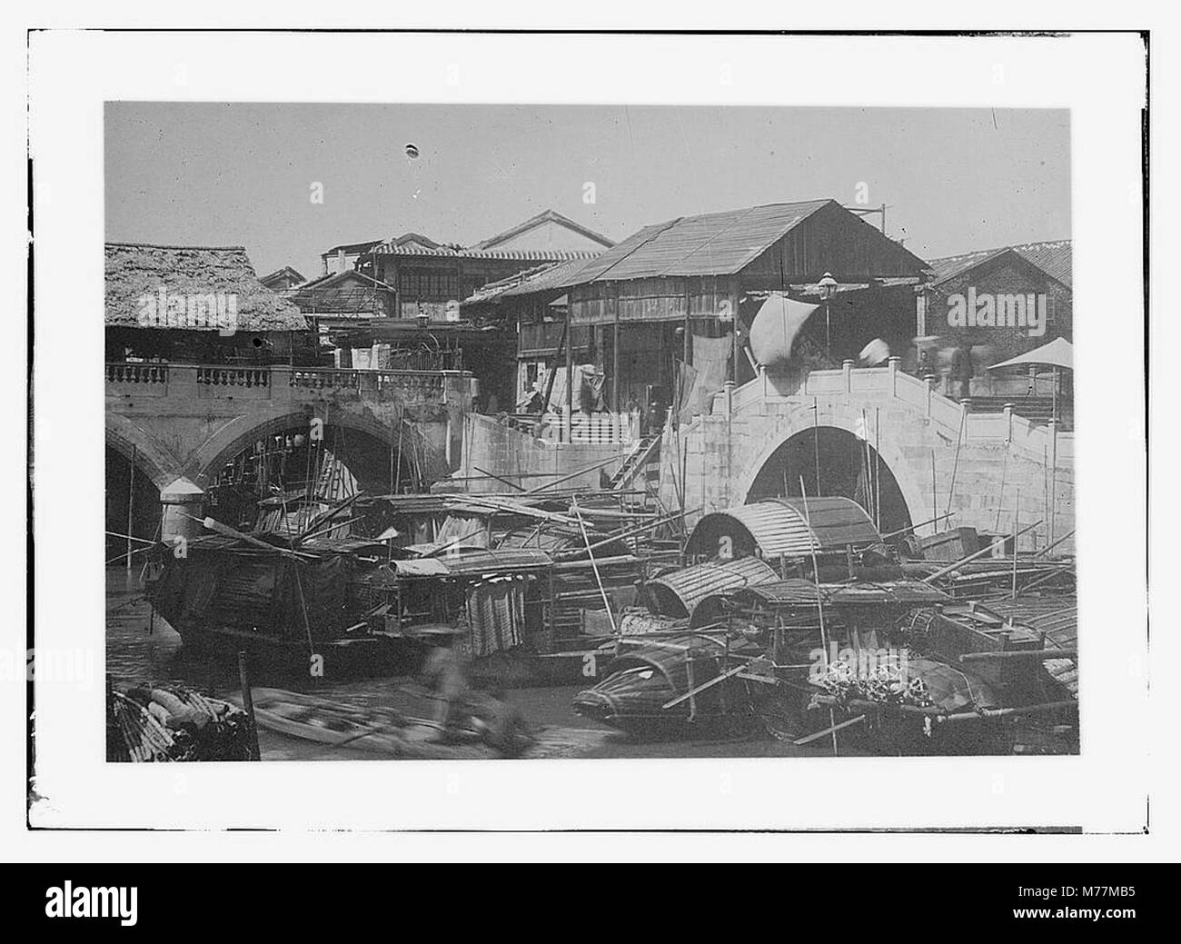 Photograph showing native sampans on the canal in Canton, China. The ...