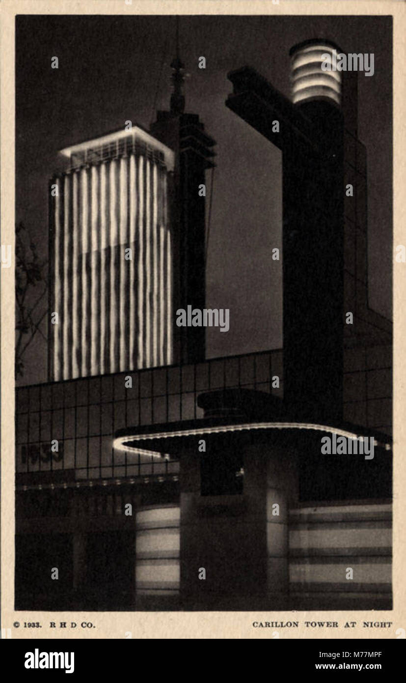 A photograph of the Carillon Tower illuminated at night, showcasing the ...