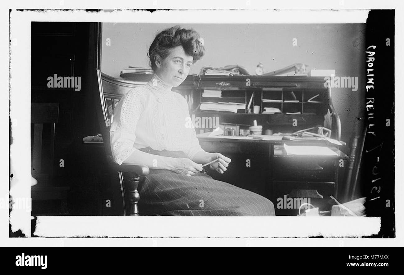 A portrait of Caroline Reilly, captured in a formal photograph. The ...
