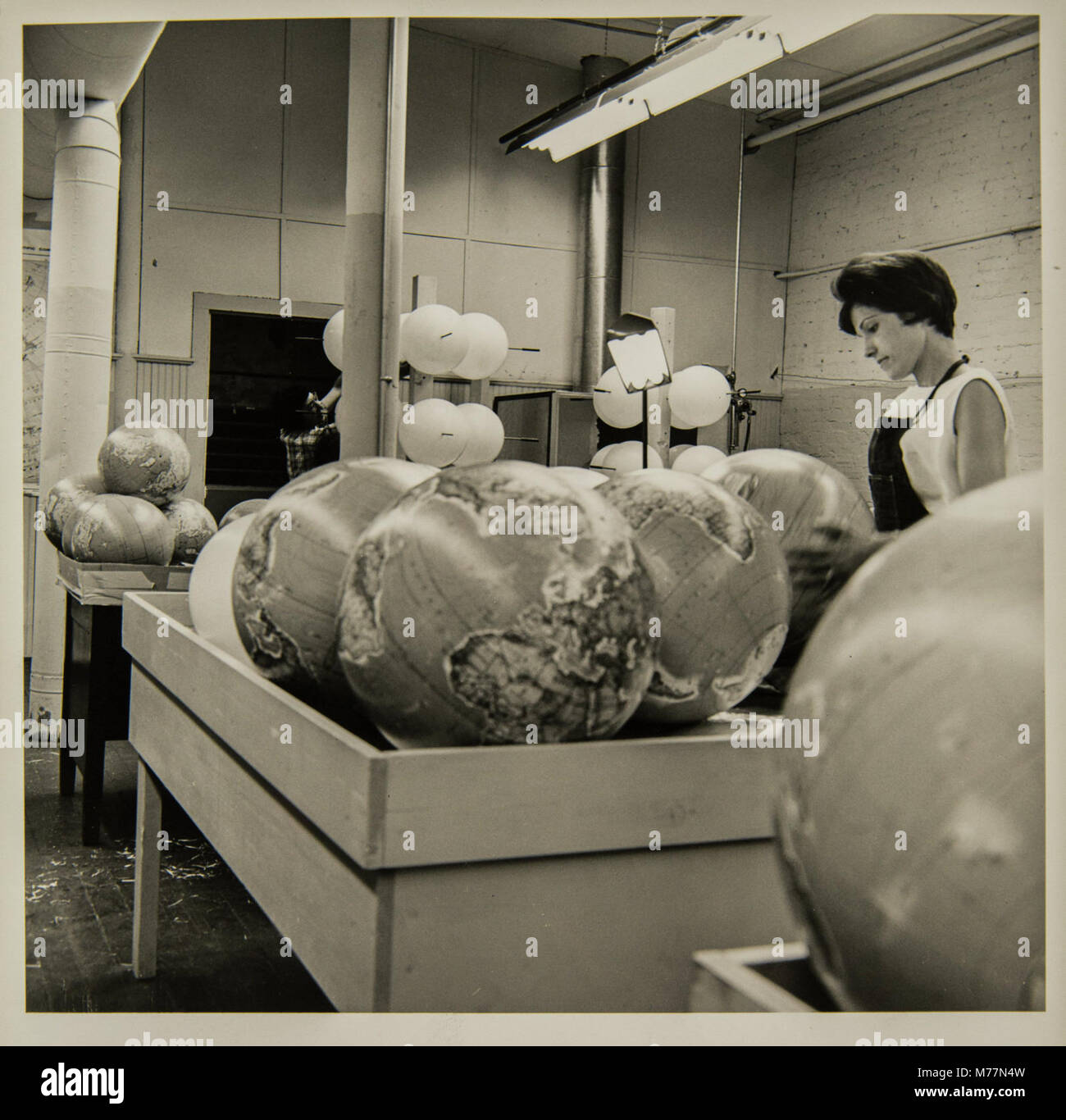 This image illustrates the manufacturing process of globes ...