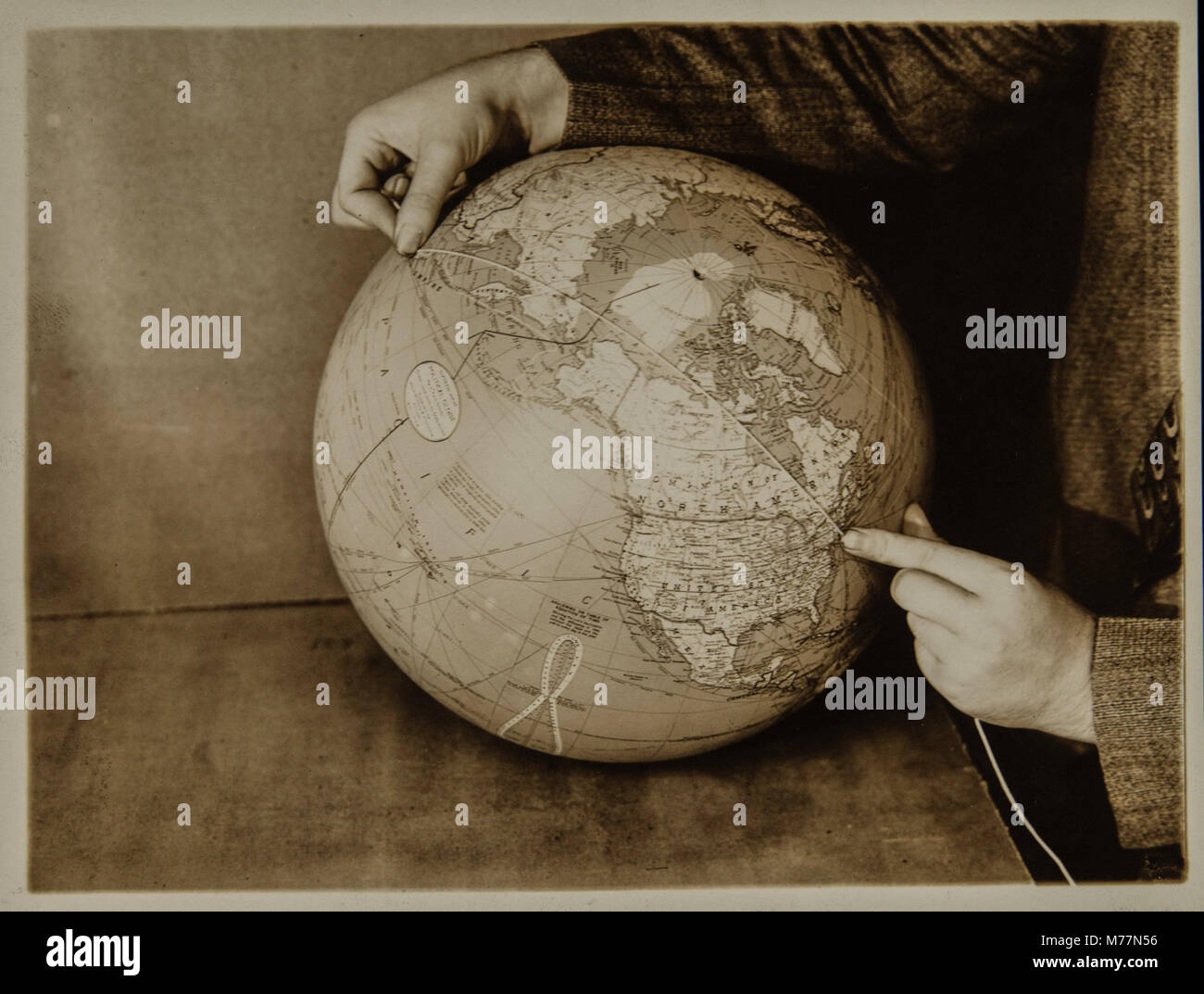 This image depicts the cartographic publishing process, focusing on the ...