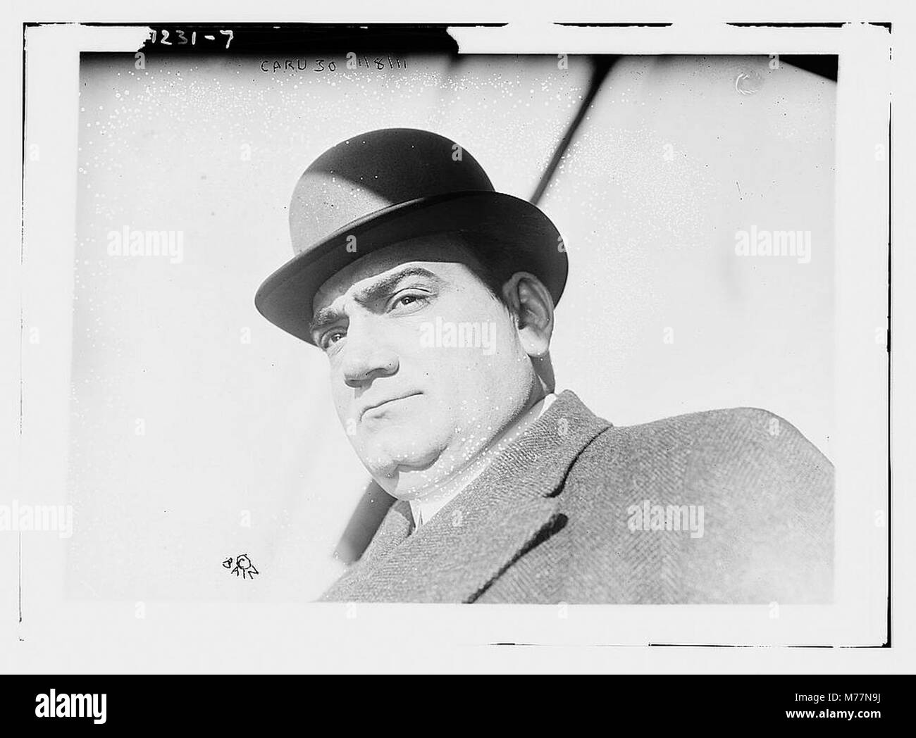 A portrait of the famous opera singer Enrico Caruso, known for his ...