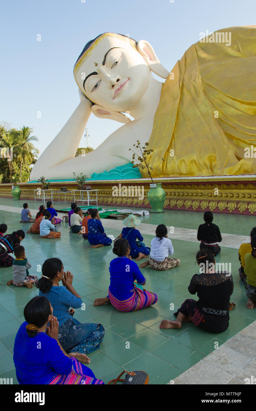 Reclining Buddha and Buddhist devotees, Bagan (Pagan), Myanmar (Burma ...
