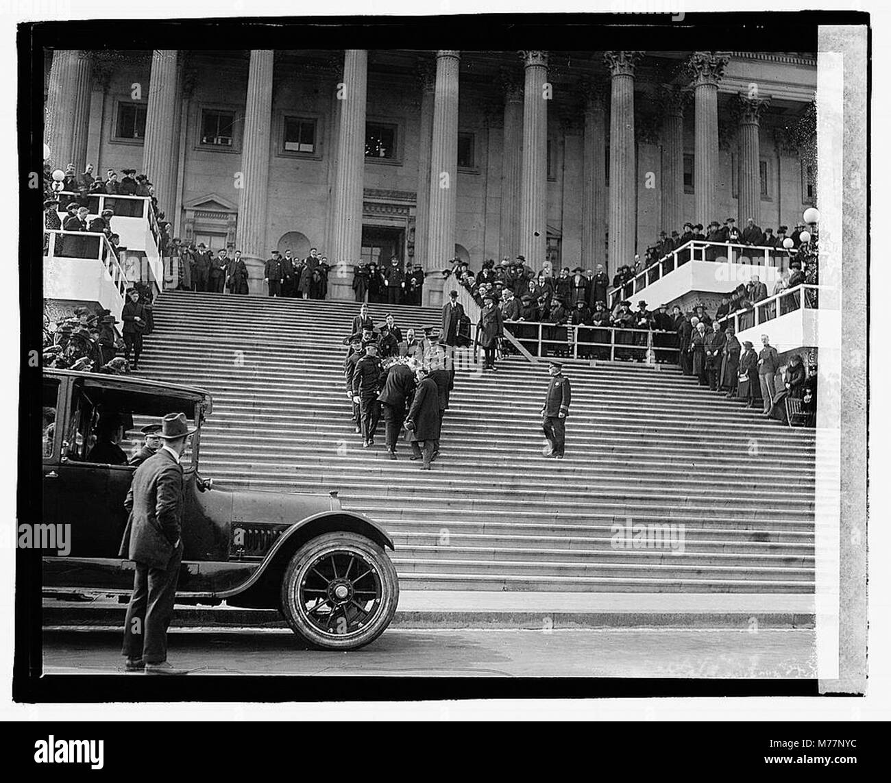This photograph captures the funeral of Champ Clark, a notable ...