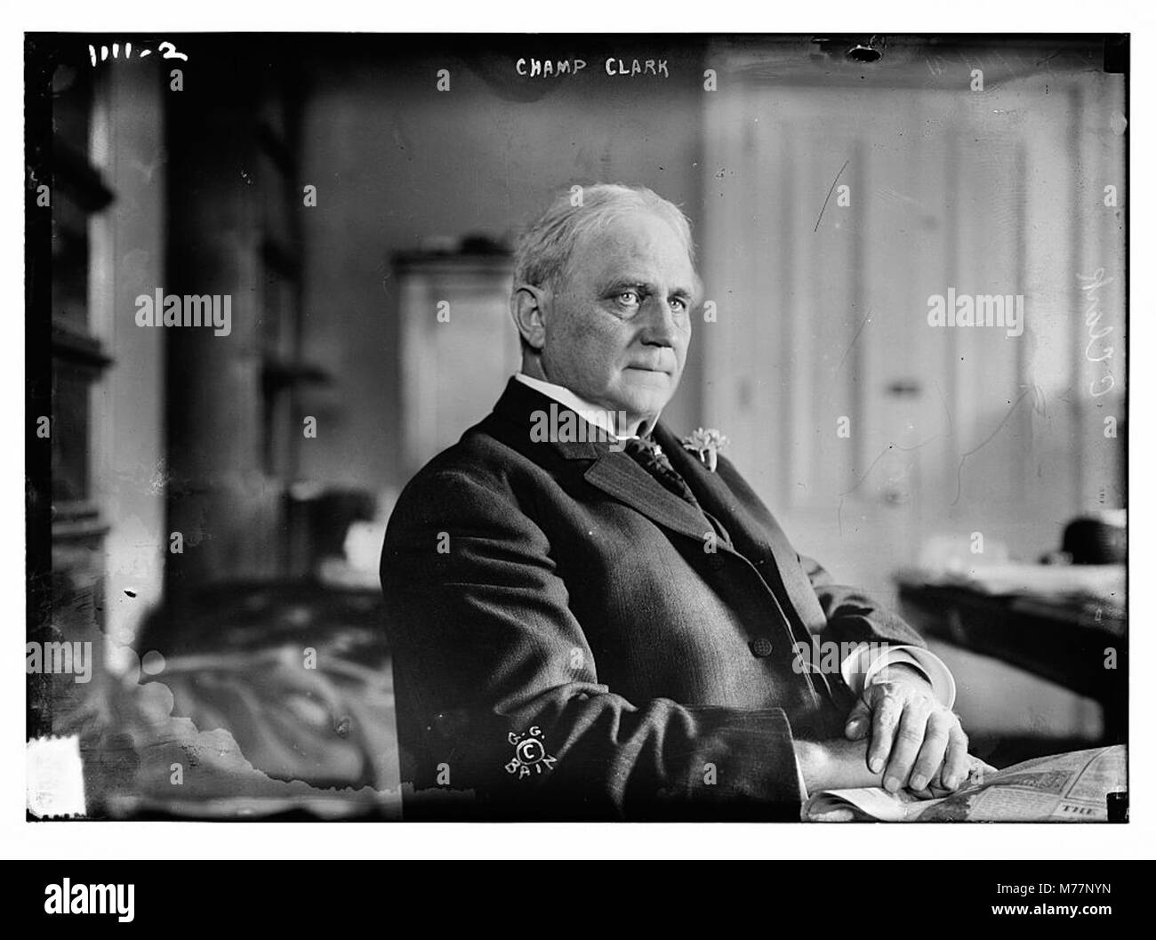 A seated portrait of Champ Clark, a notable American politician, with a ...