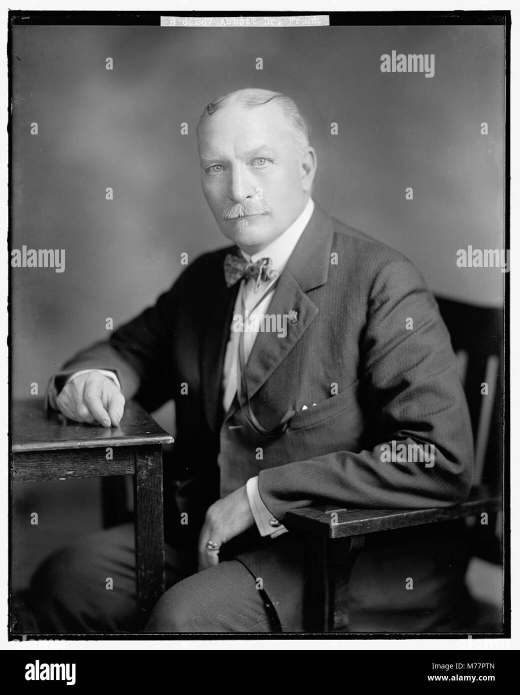 This portrait features Dr. Frank Abbott, a prominent physician. The ...