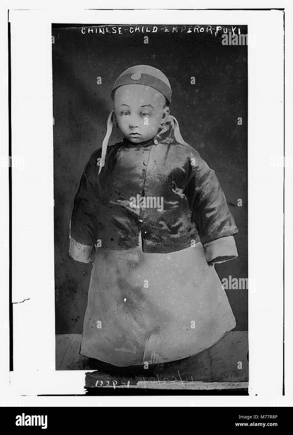 This image depicts Emperor Pu Yi of China as a child, showcasing his ...