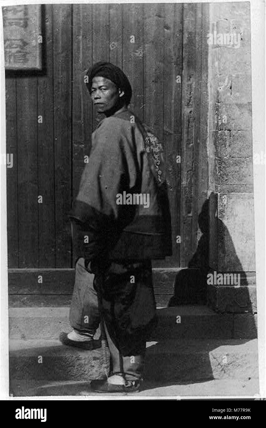 A portrait of a Chinese soldier, captured during the early 20th century ...