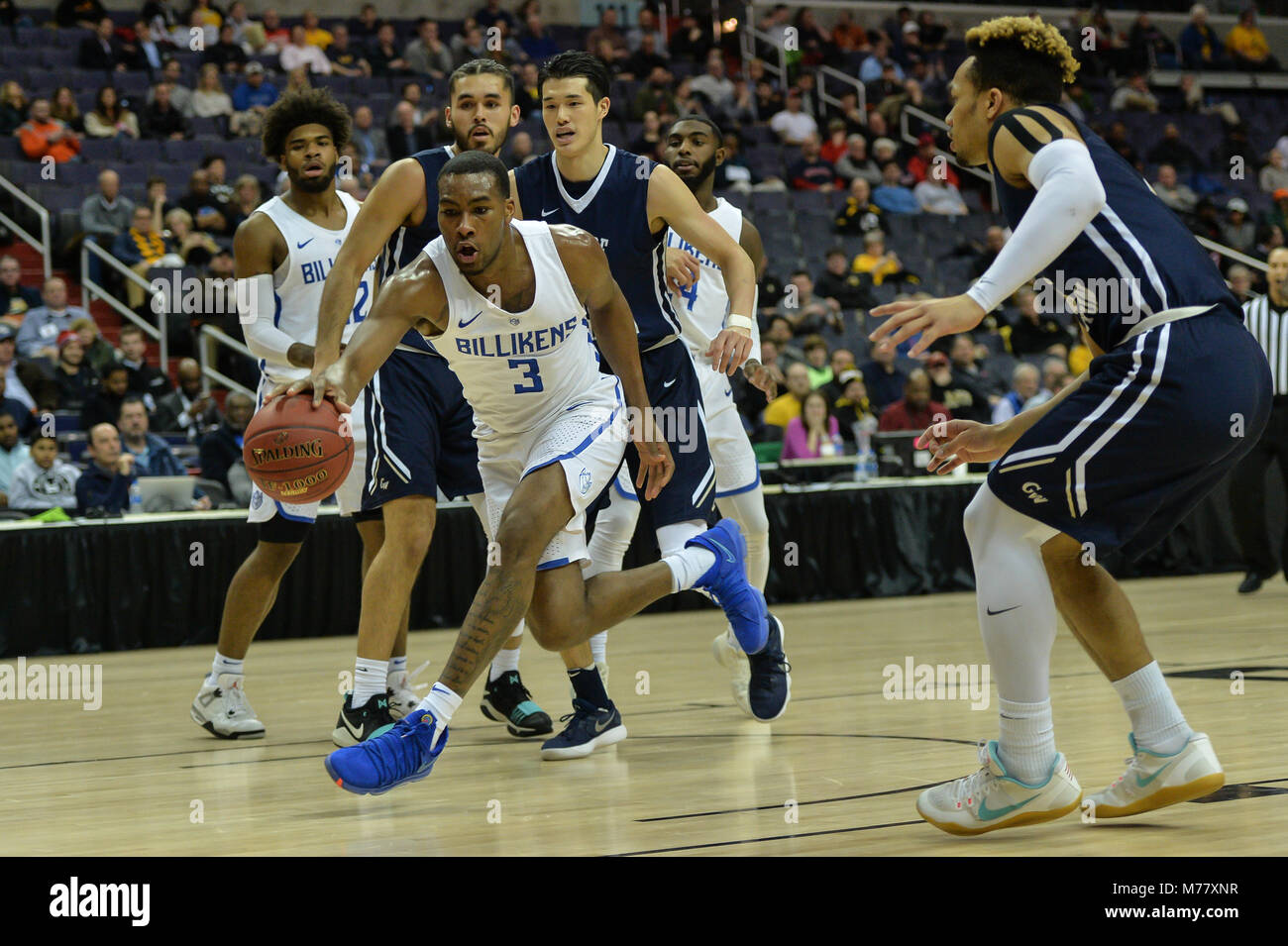 Washington, DC, USA. 8th Mar, 2018. JAVON BESS (3) scrambles for a ...