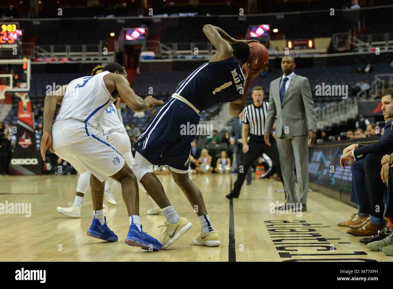 Washington, DC, USA. 8th Mar, 2018. TERRY NOLAN JR (1) struggles to ...